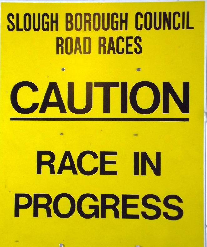 Lot 12 - Road signs & a collection of pit passes