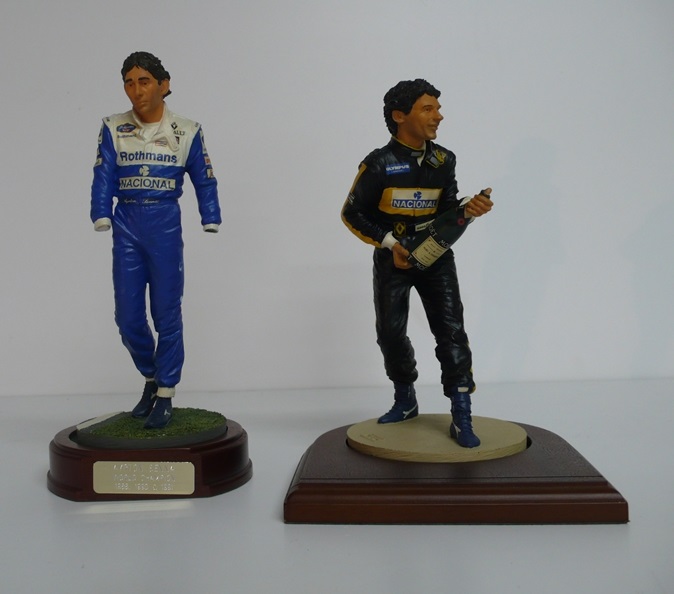 Lot 90 - Two 1/8 scale motor racing driver figures,